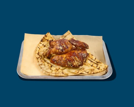 Halbes_Hähnchen_Nhas_Spezial_image